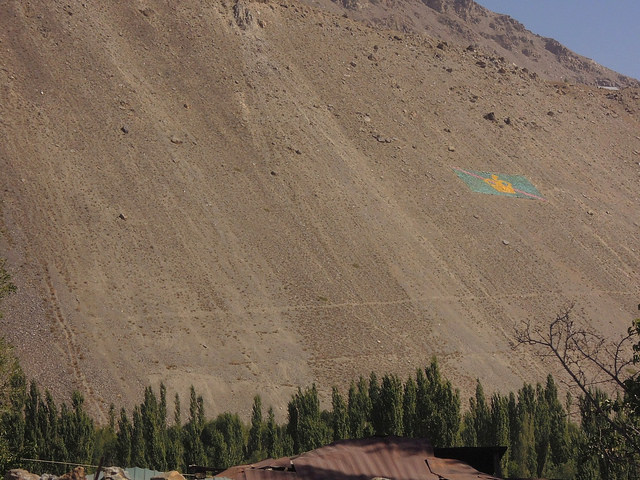 Khorog, Tajikistan: Ismaili flag on the mountain slope – Ismailimail
