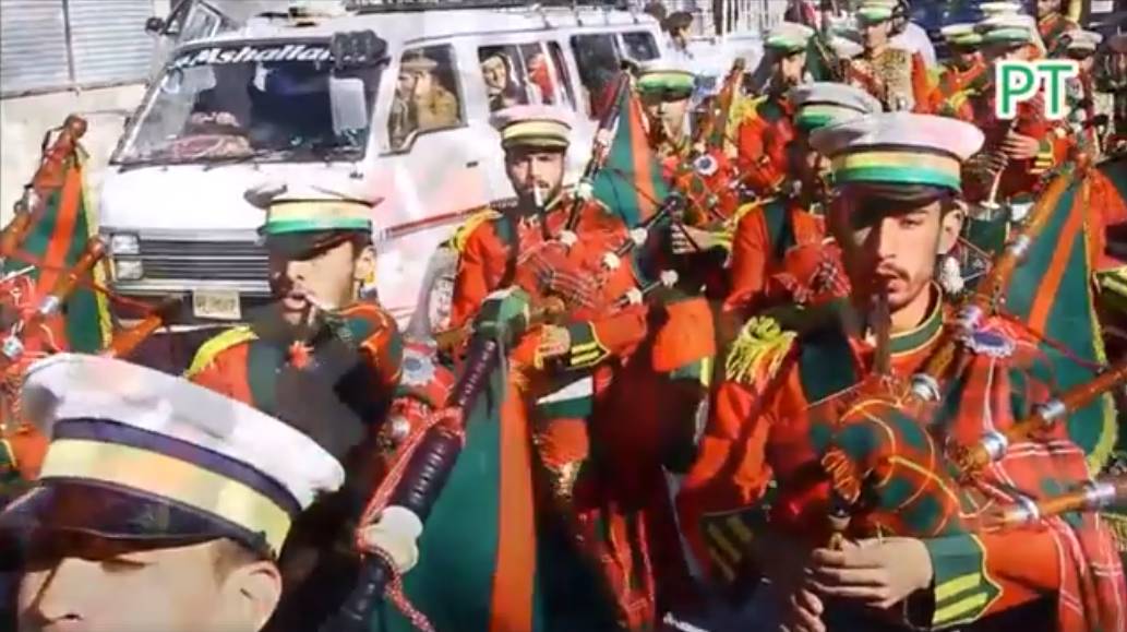 Pipe Band from Hunza participate in a rally to celebrate the arrival of ...